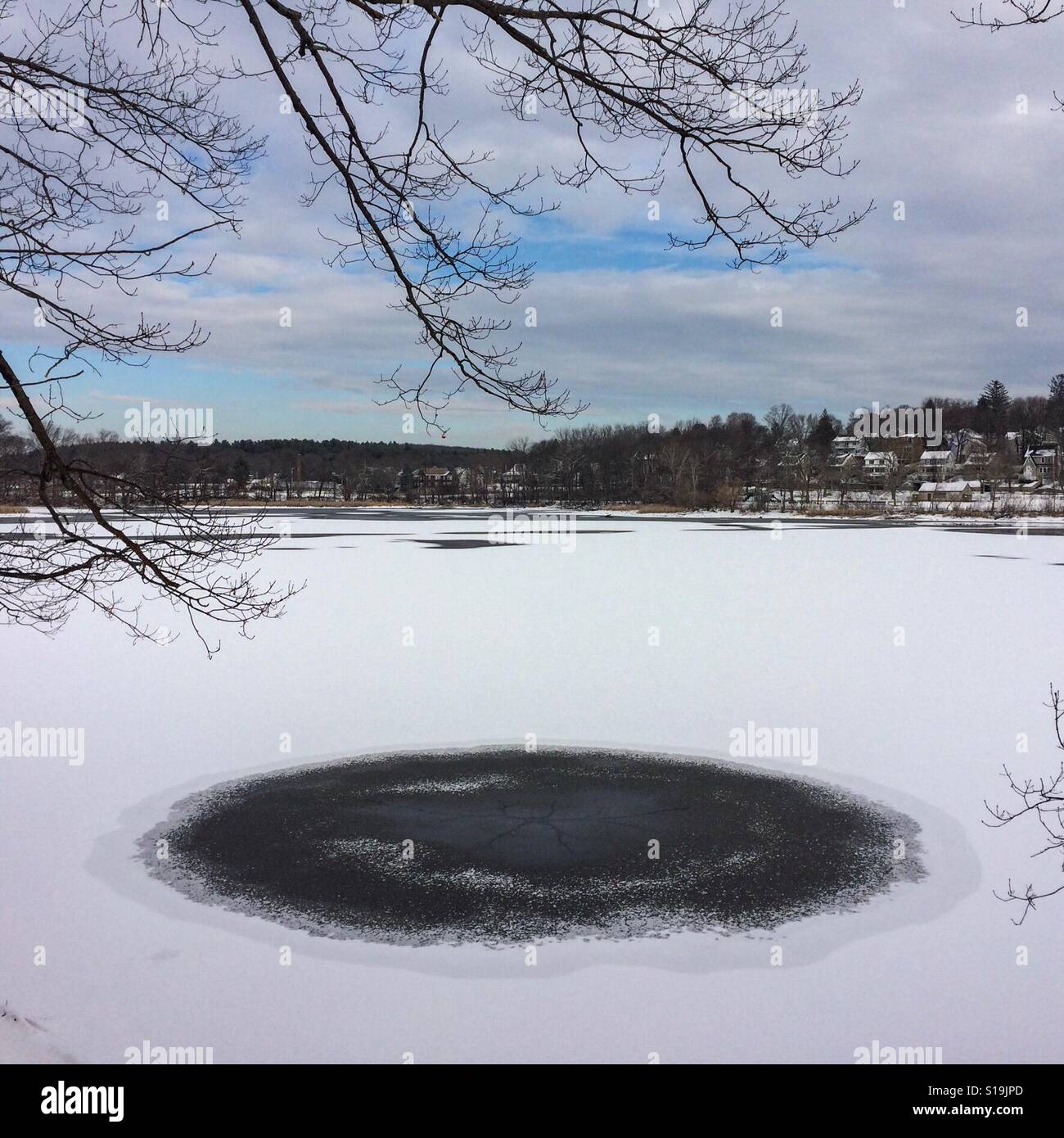 Ice on pond Stock Photo - Alamy