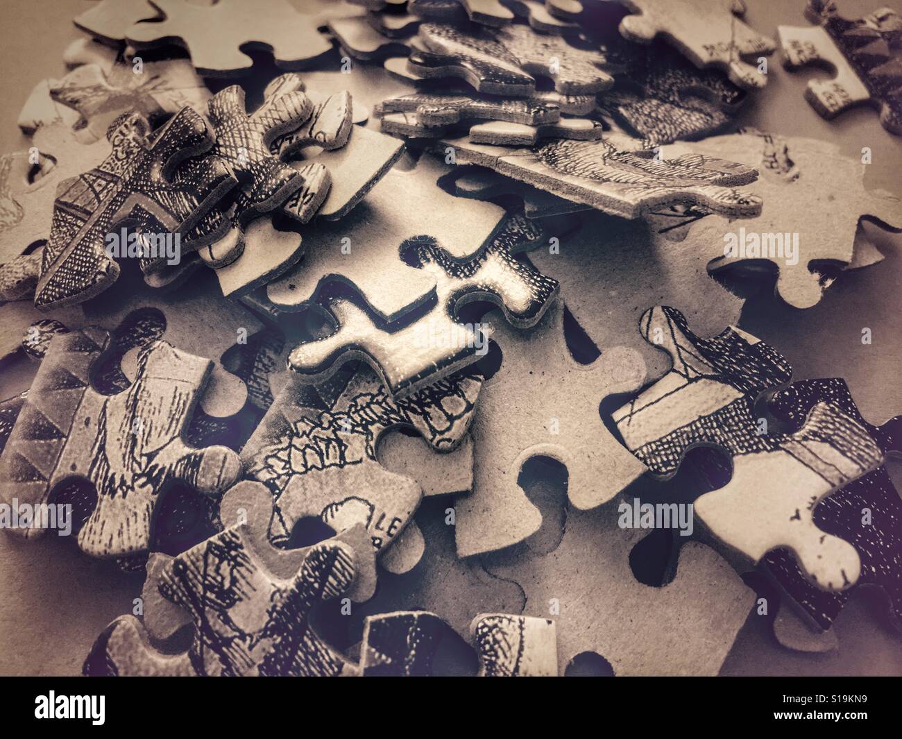 Pile of jigsaw puzzle pieces Stock Photo - Alamy