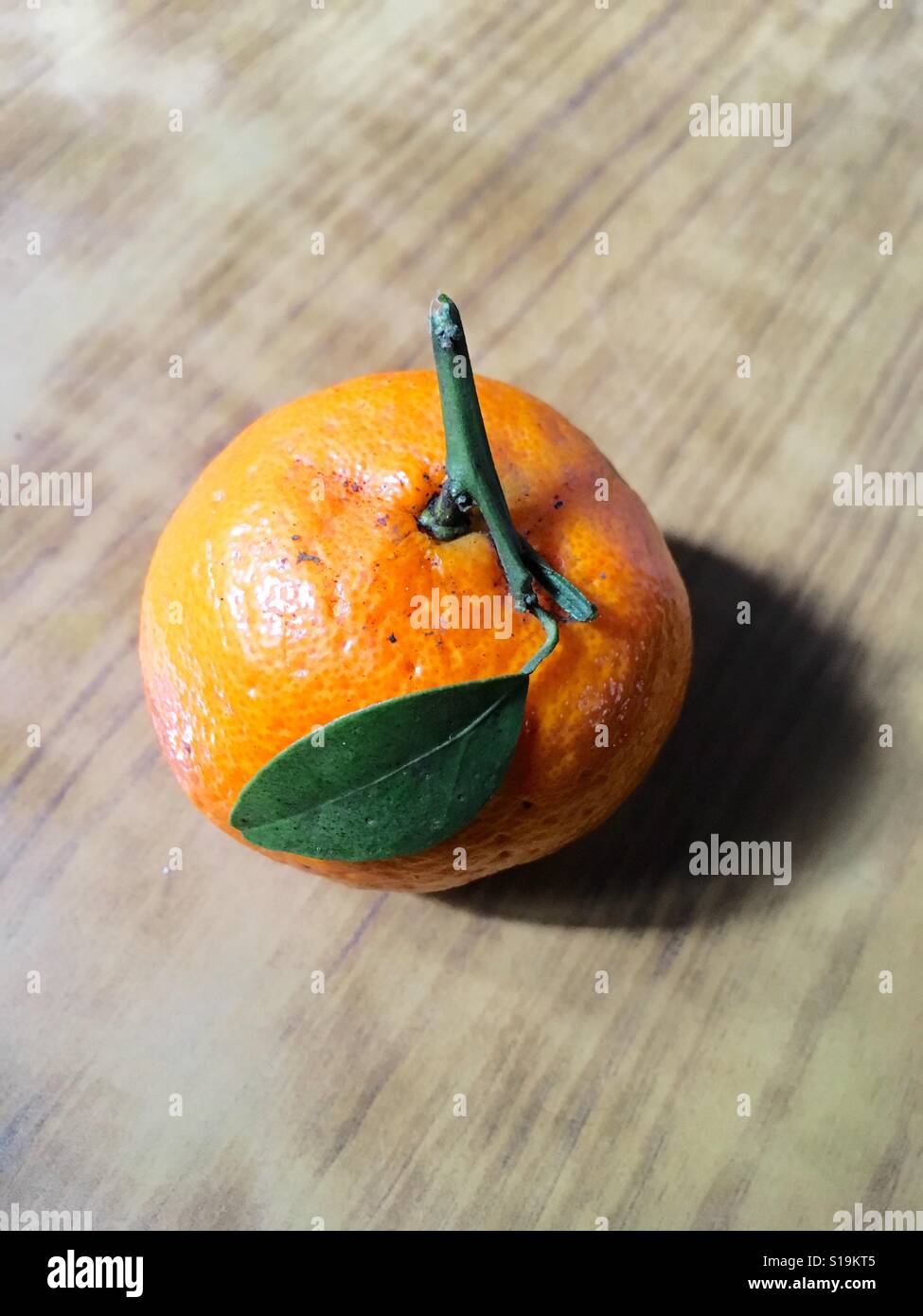 Orange on a table Stock Photo - Alamy