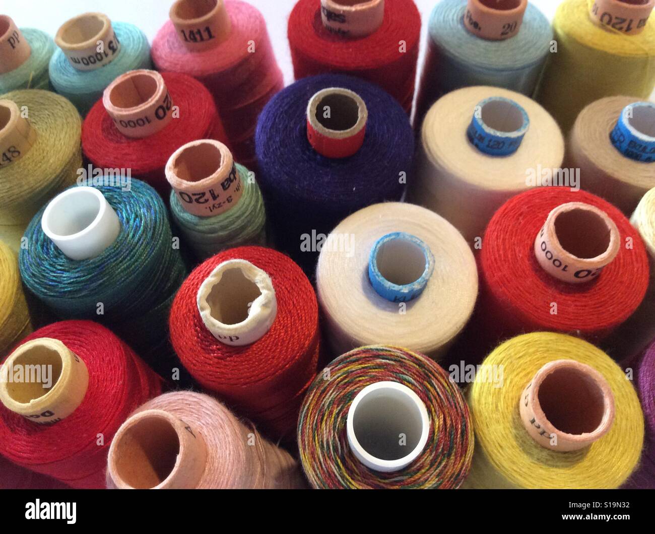 Colored thread spooles Stock Photo - Alamy
