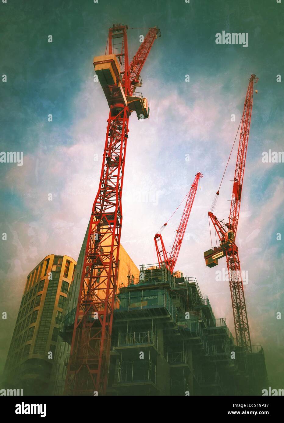 A series of construction cranes in London Stock Photo - Alamy