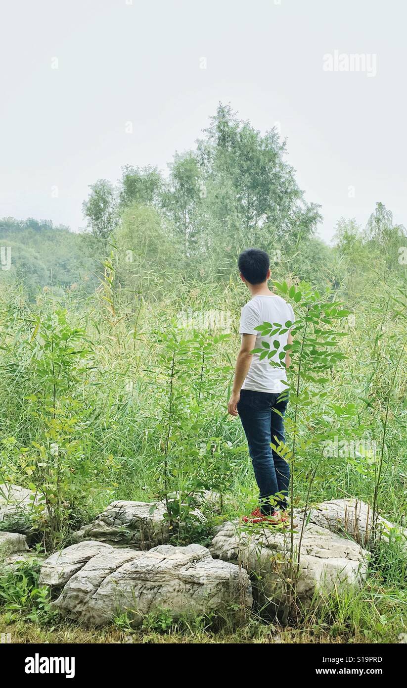 Man in nature Stock Photo - Alamy