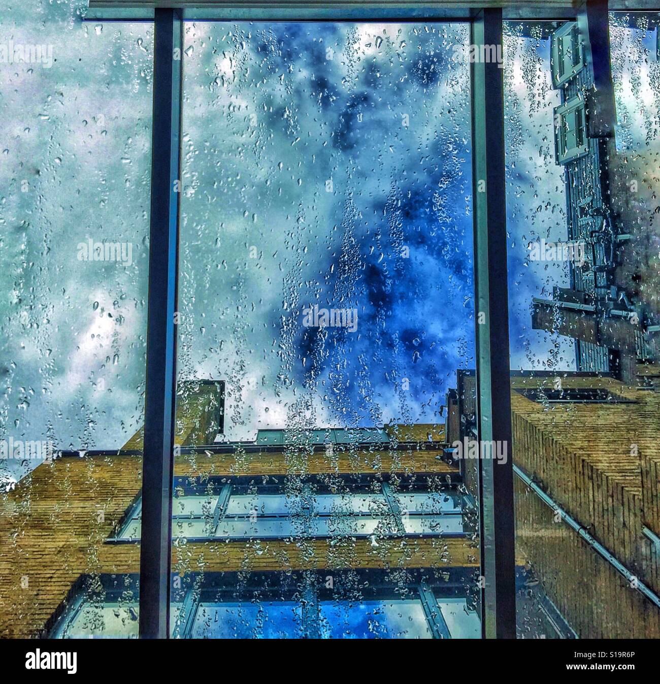Rain through a glass window Stock Photo - Alamy