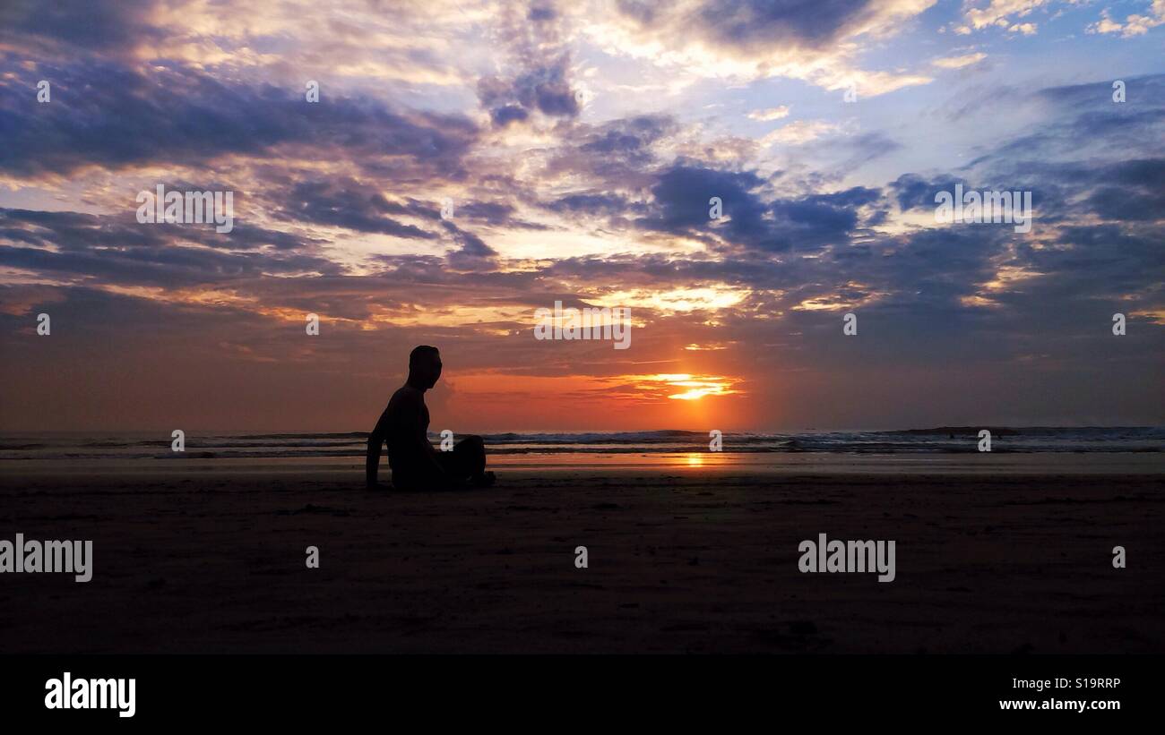Man watching sunset hi-res stock photography and images - Alamy