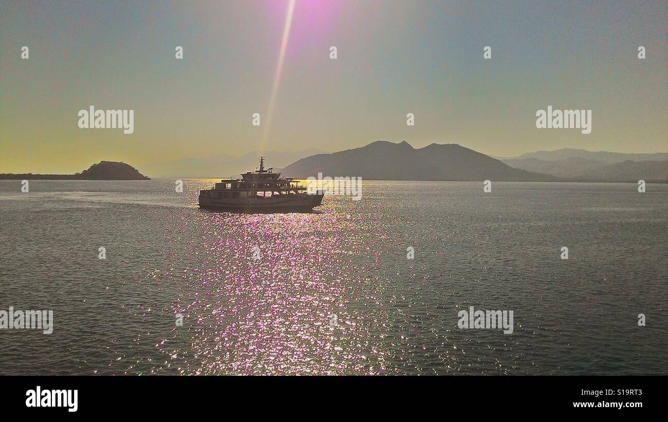 Ferry Boat Sailing at Ocean in Flores Island Sea Stock Photo - Alamy