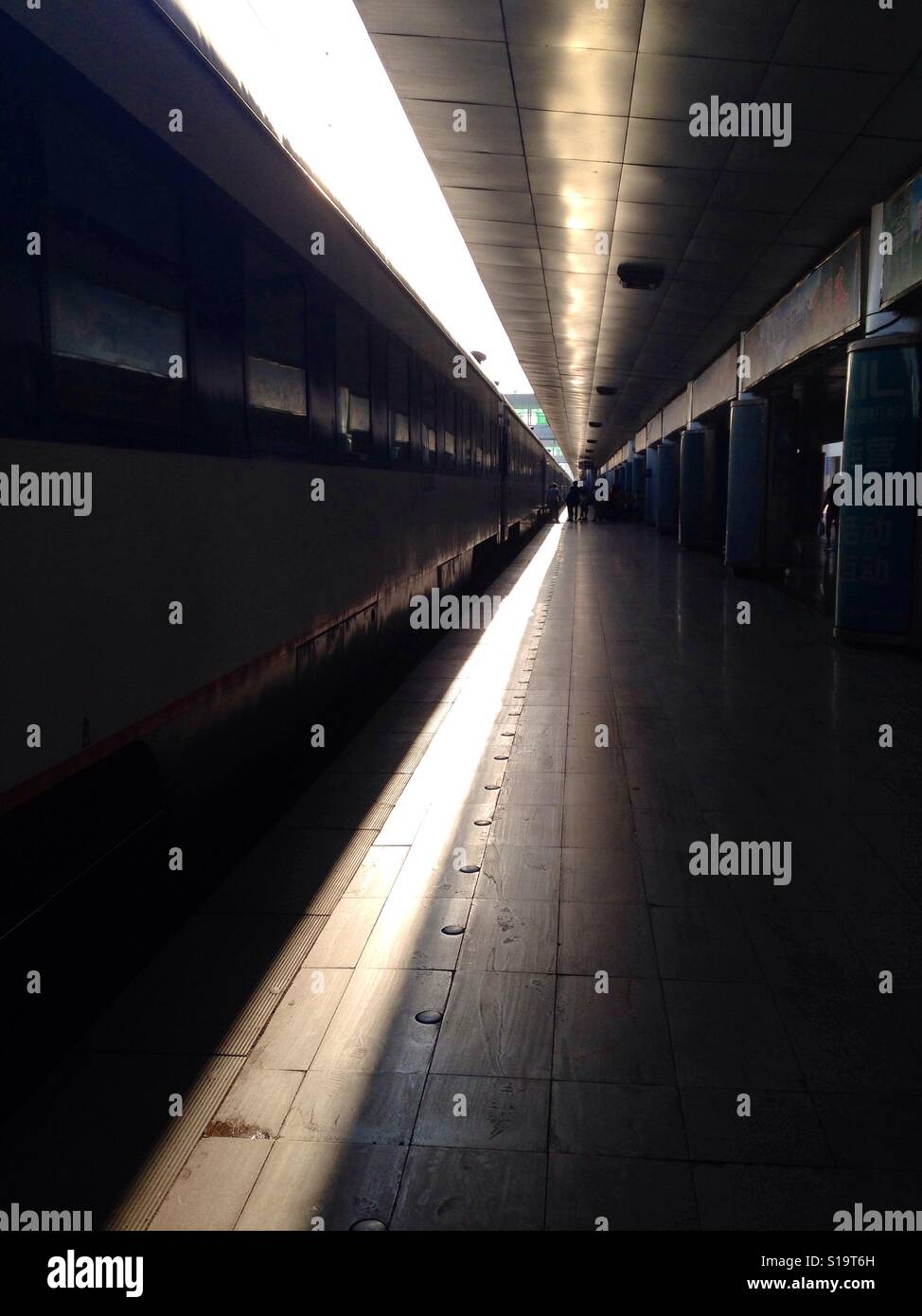 View of train at platform, shapes in light Stock Photo - Alamy