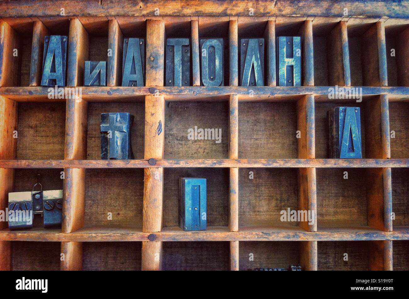 Greek metallic typography letters reading 'East' Stock Photo - Alamy