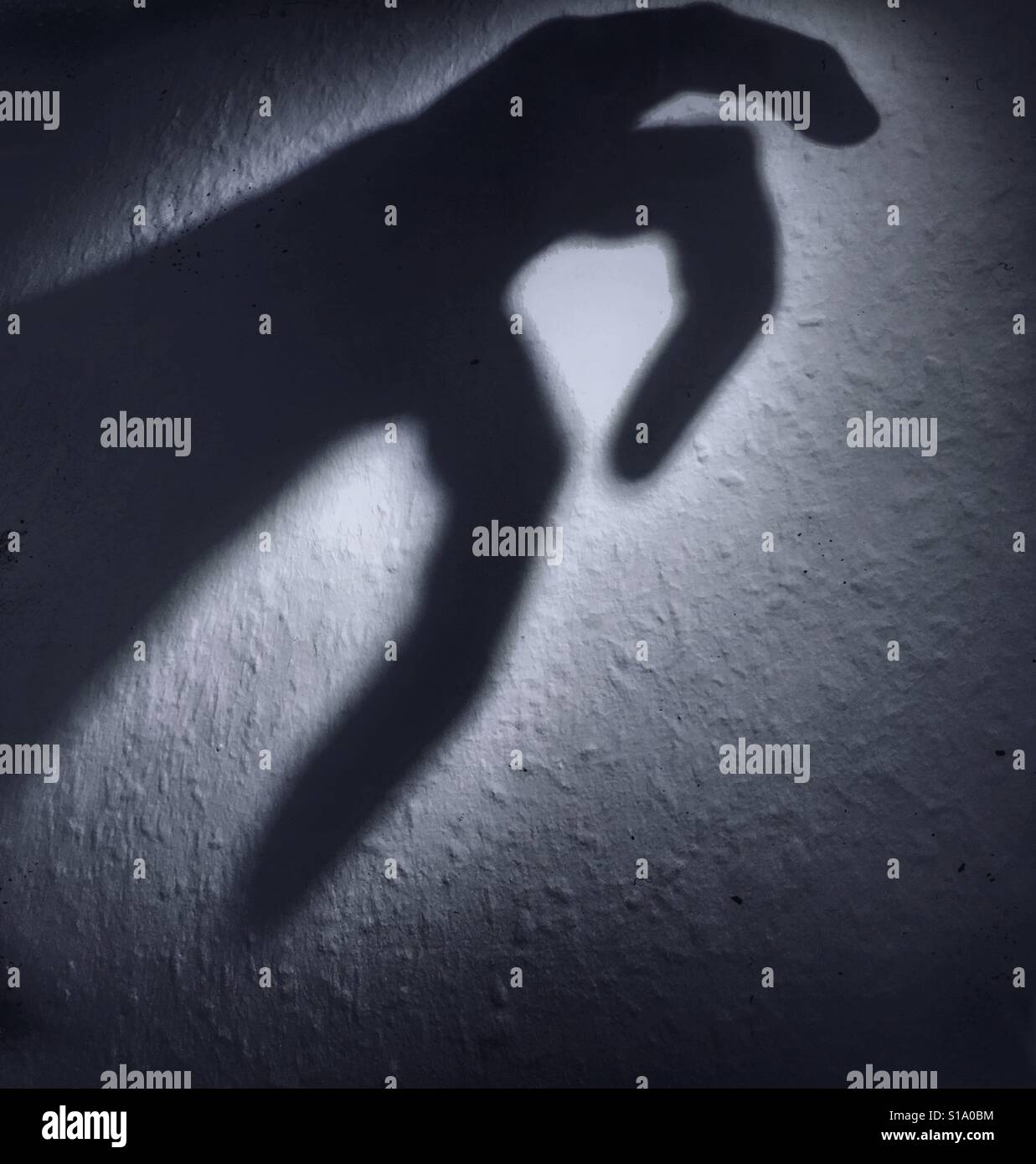 Scary hand shadow hi-res stock photography and images - Alamy
