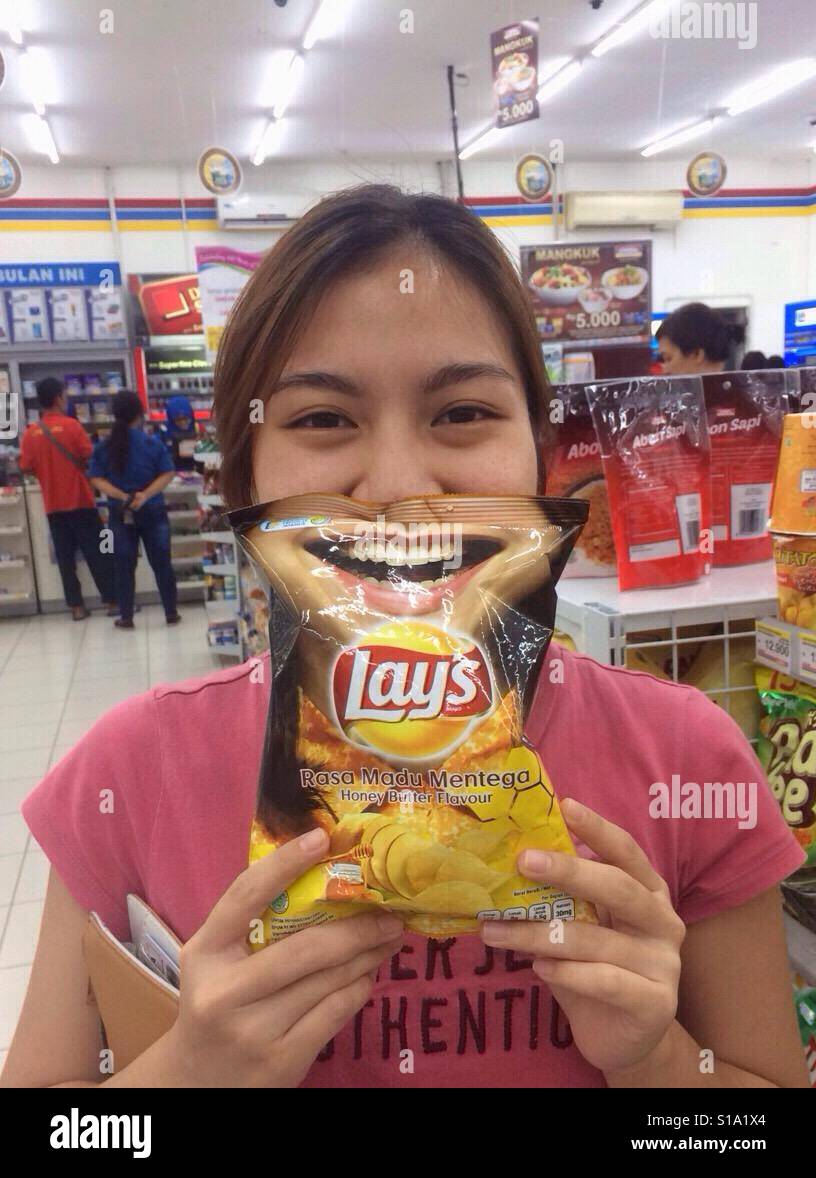Smile with Lays Snack Stock Photo - Alamy