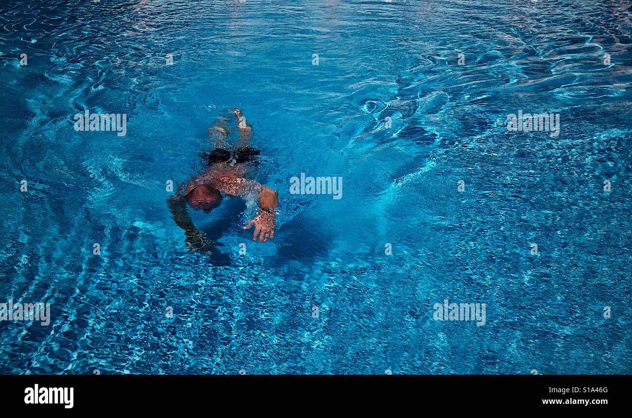 Man swimming pool hi-res stock photography and images - Alamy