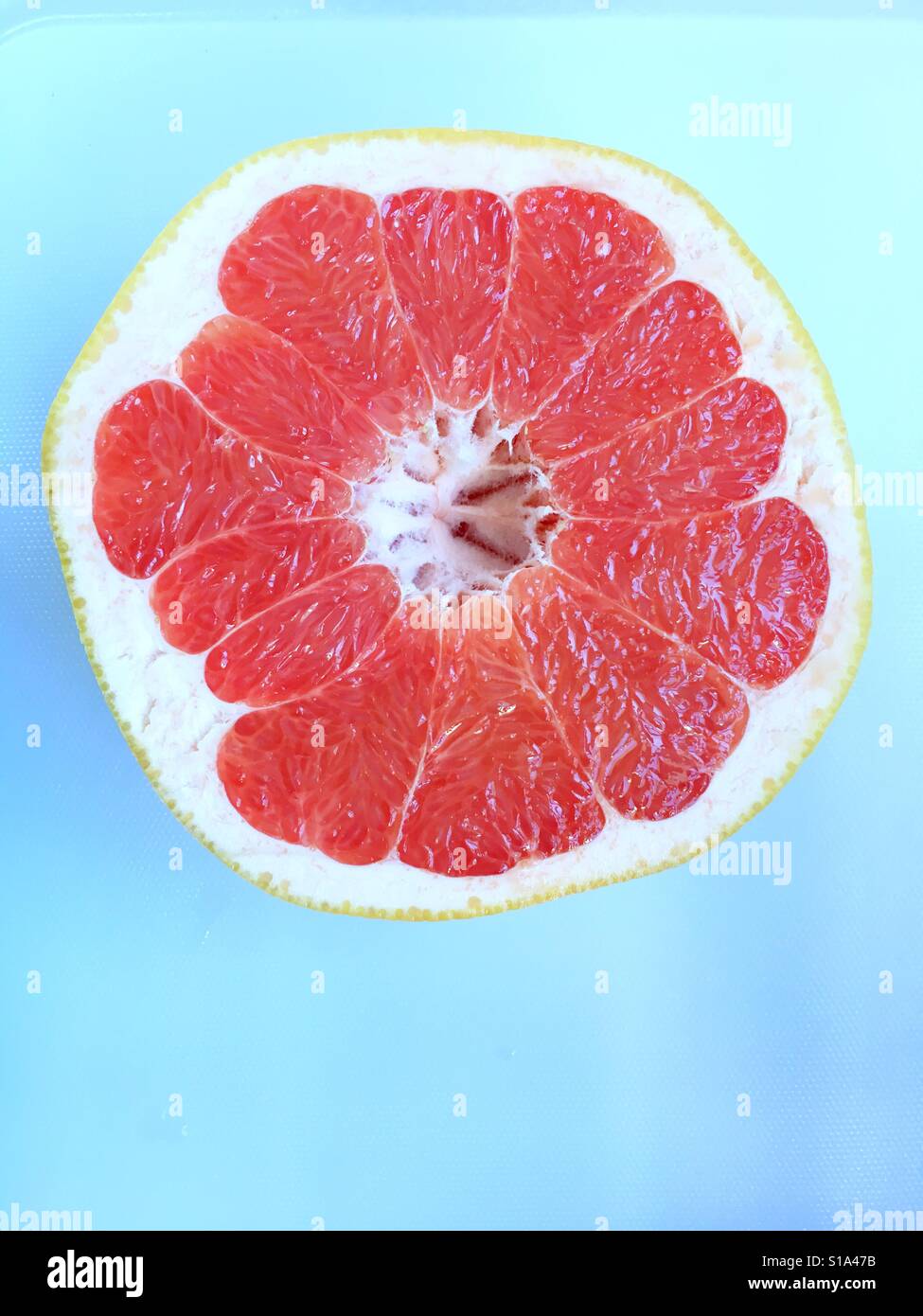 Ruby red grapefruit Stock Photo - Alamy