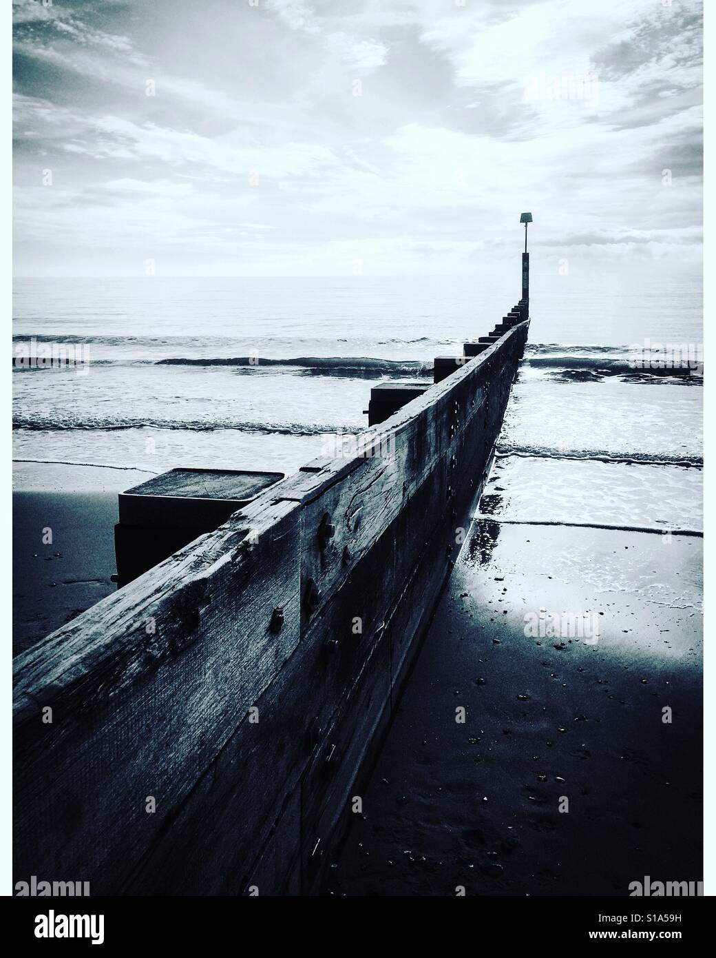 Wooden breakwater on Bournemouth beach Dorset UK Stock Photo - Alamy