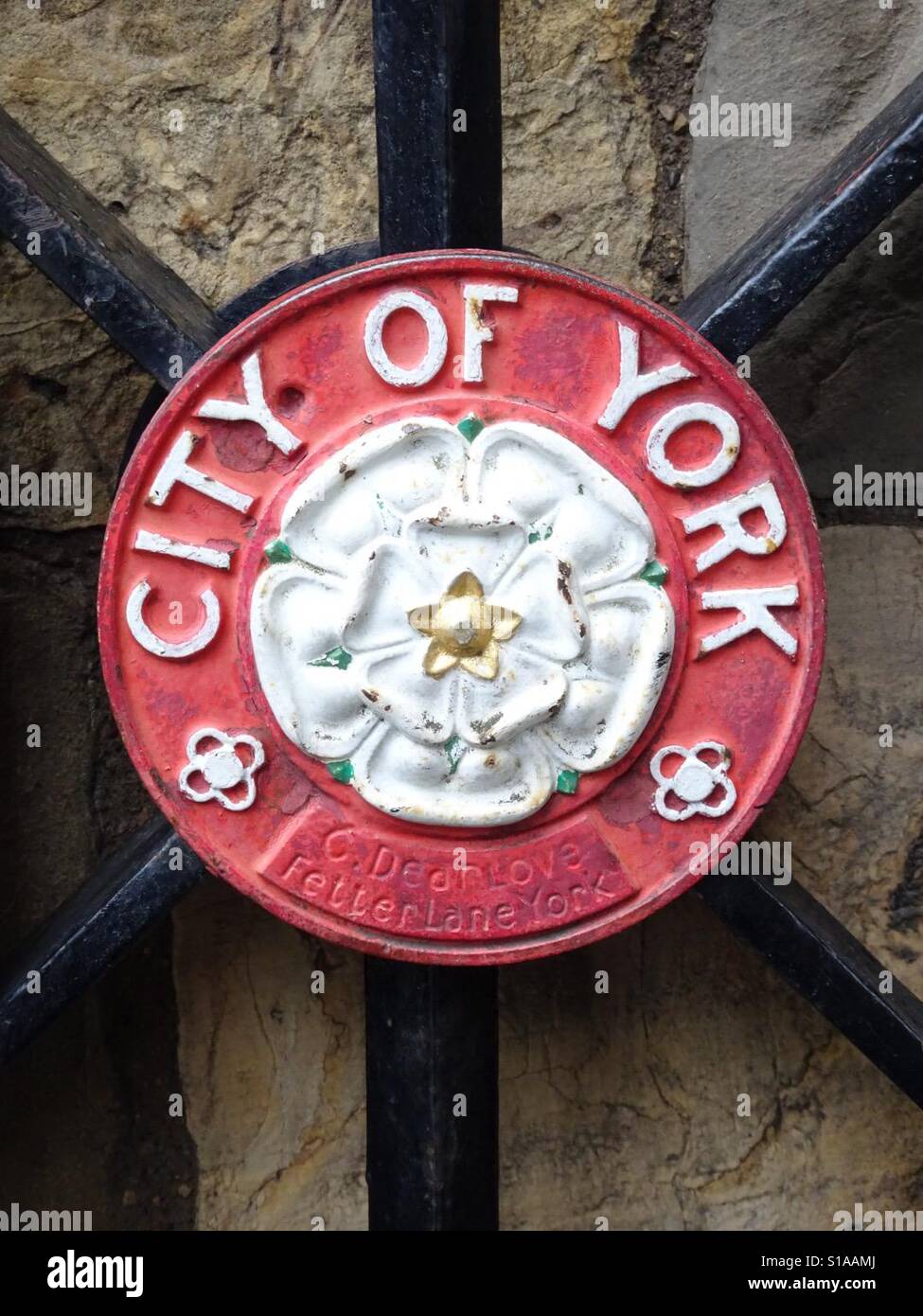Gate motif on York, England's medieval city walls Stock Photo - Alamy