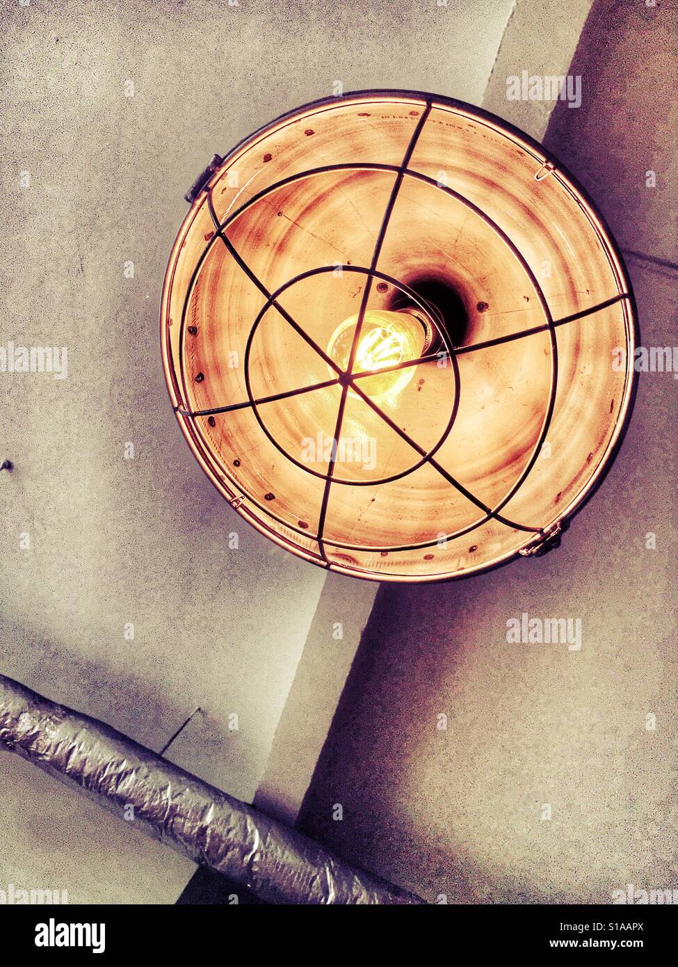 Industrial light fixture Stock Photo - Alamy
