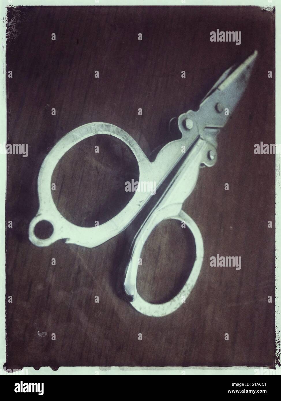 Small scissor hi-res stock photography and images - Alamy