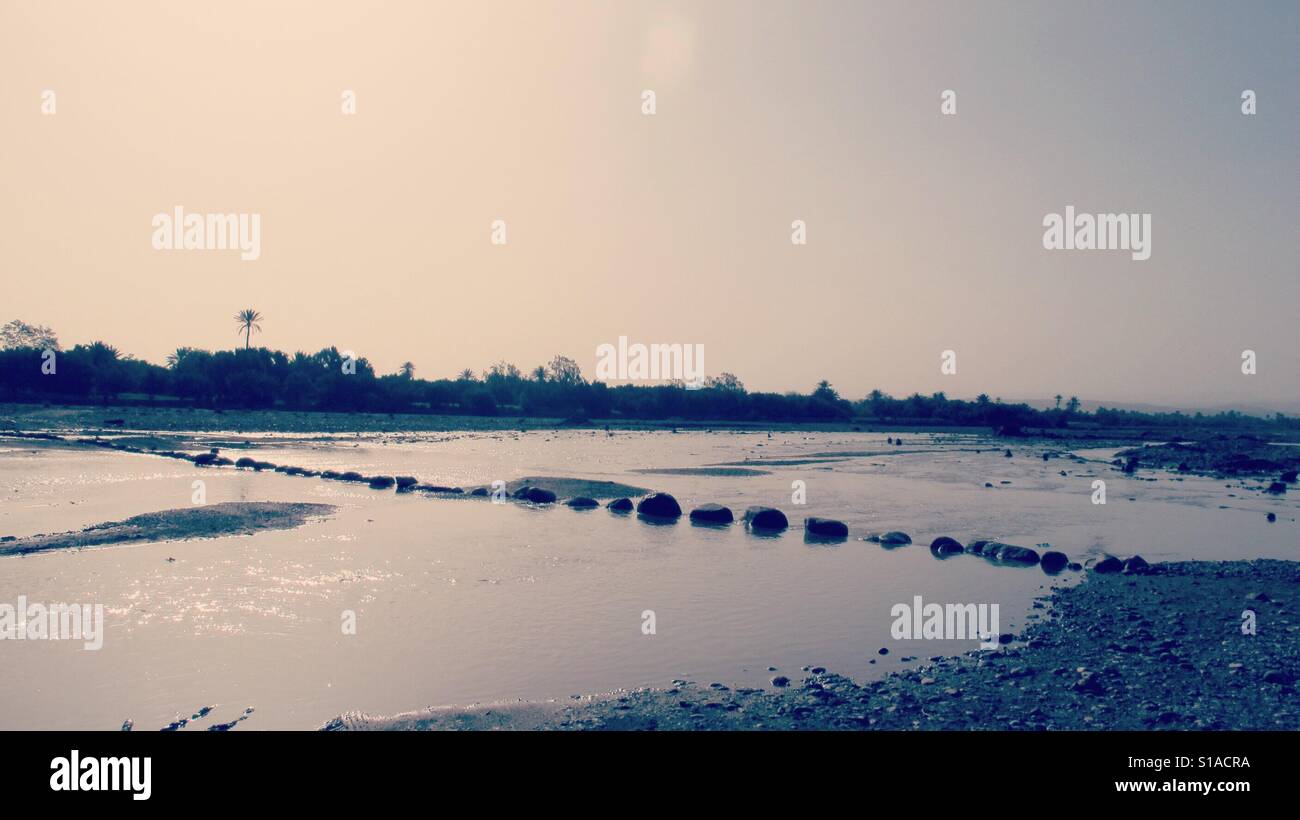 Steps across the water Stock Photo - Alamy