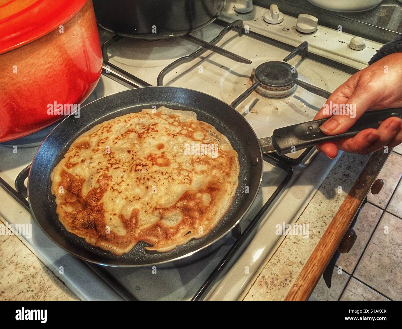 Making pancakes on Shrove Tuesday, Pancake Day Stock Photo - Alamy