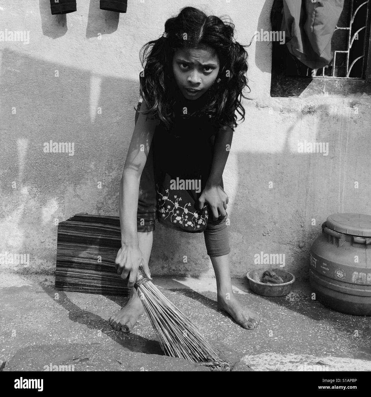 Sweeping and girl hi-res stock photography and images - Alamy