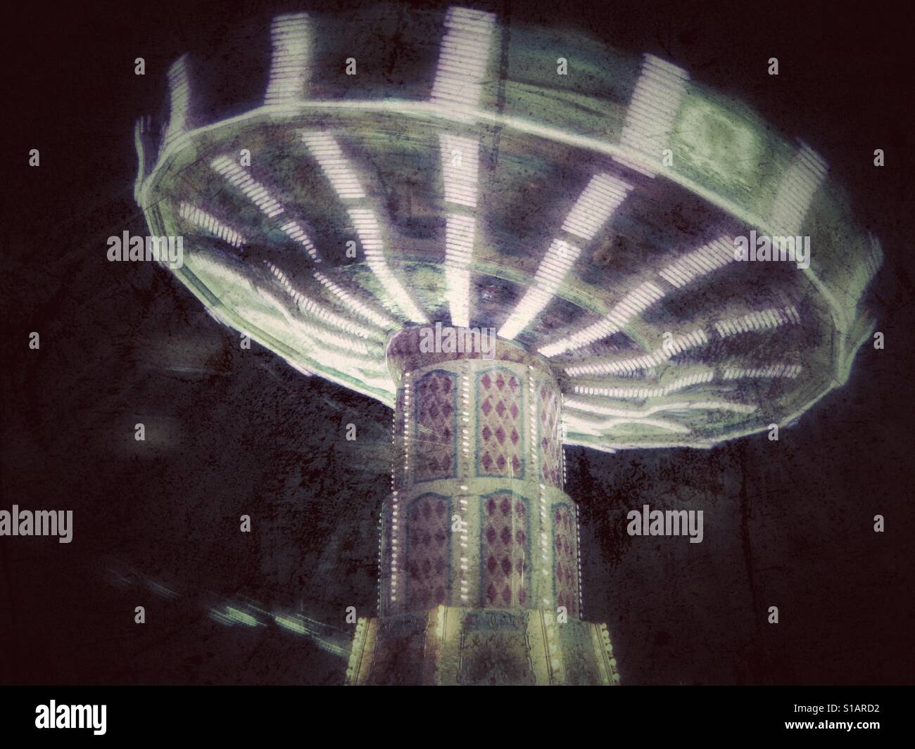 Swing chair fun fair ride in Paris, France Stock Photo - Alamy