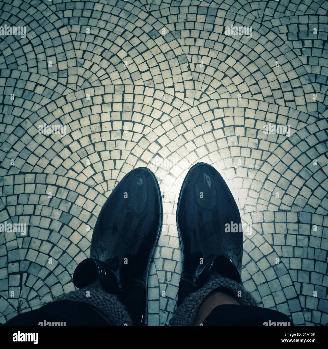 Fashionable rubber booties on tile floor in Vancouver Art Gallery, BC ...