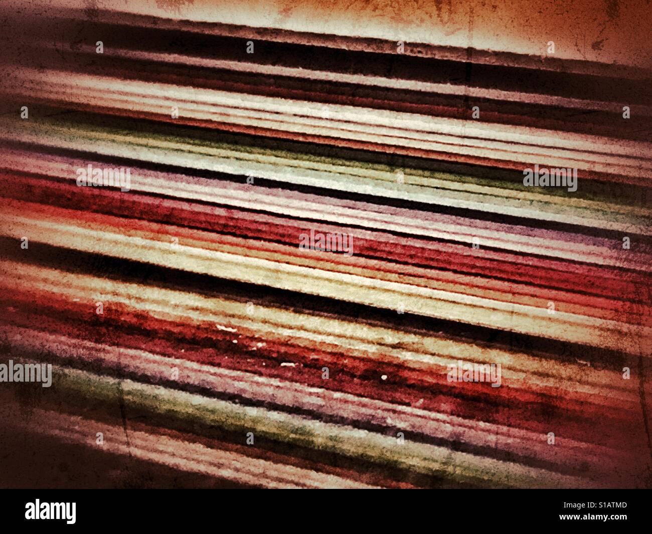 Stack of coloured paper, close up Stock Photo - Alamy