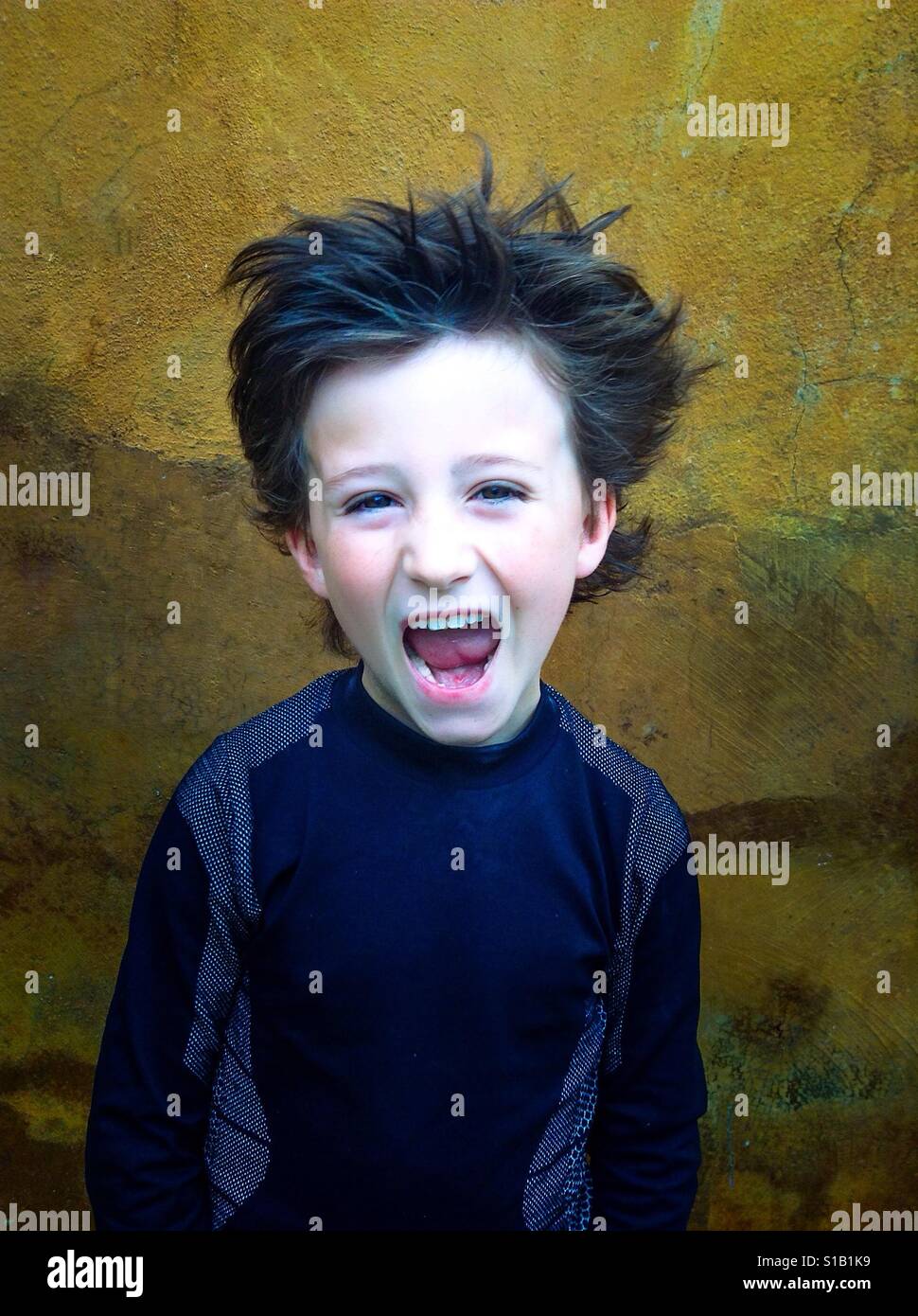 Boy excited and happy portrait Stock Photo - Alamy