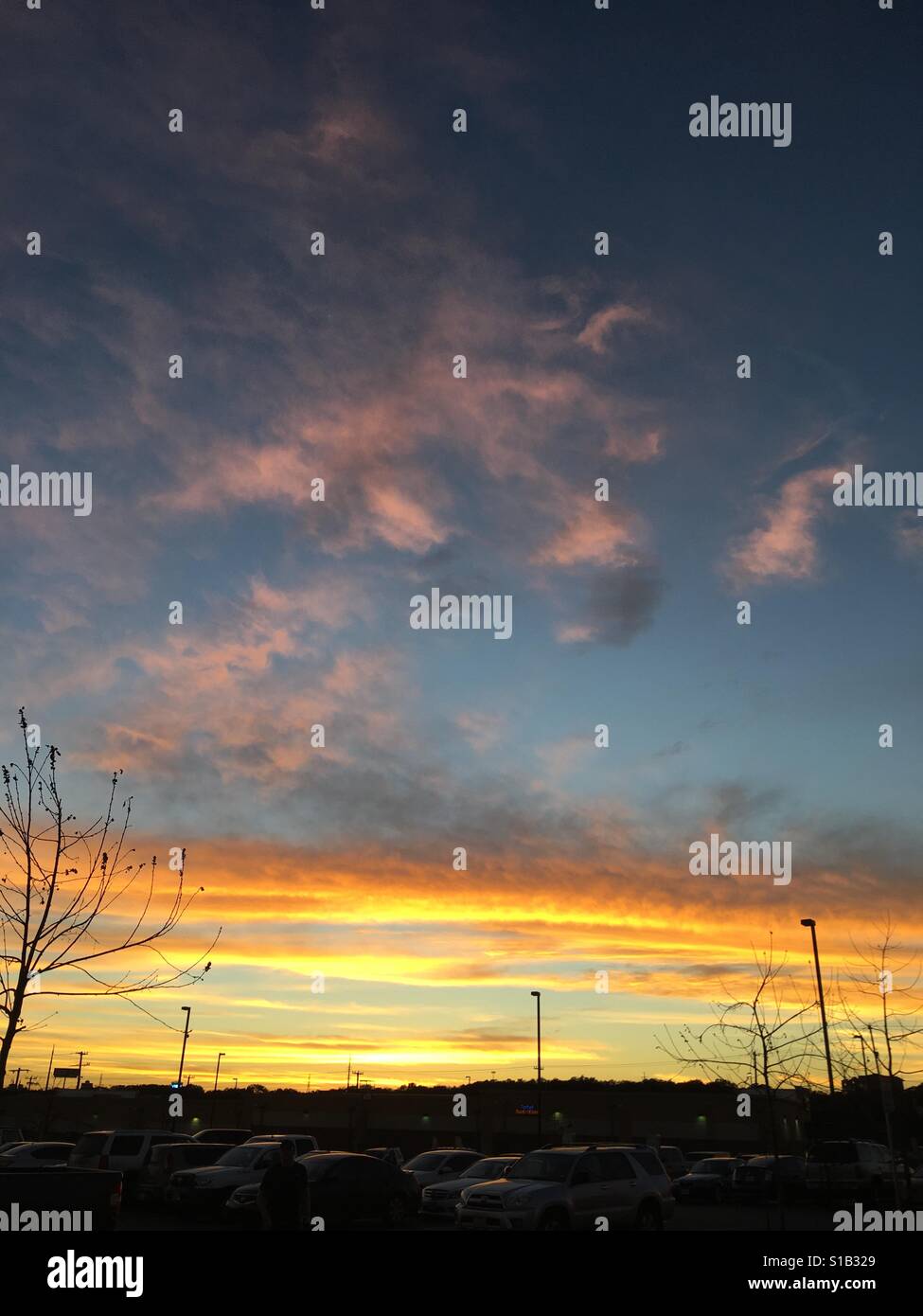 Texas Sunset over parking lot Stock Photo - Alamy