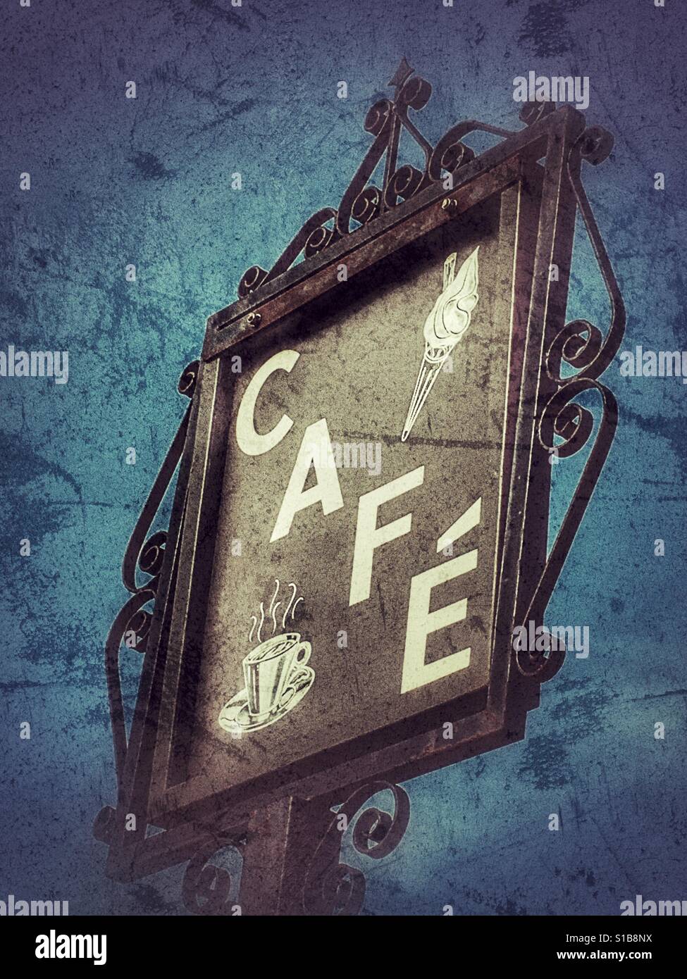 Cafe sign against blue sky Stock Photo - Alamy