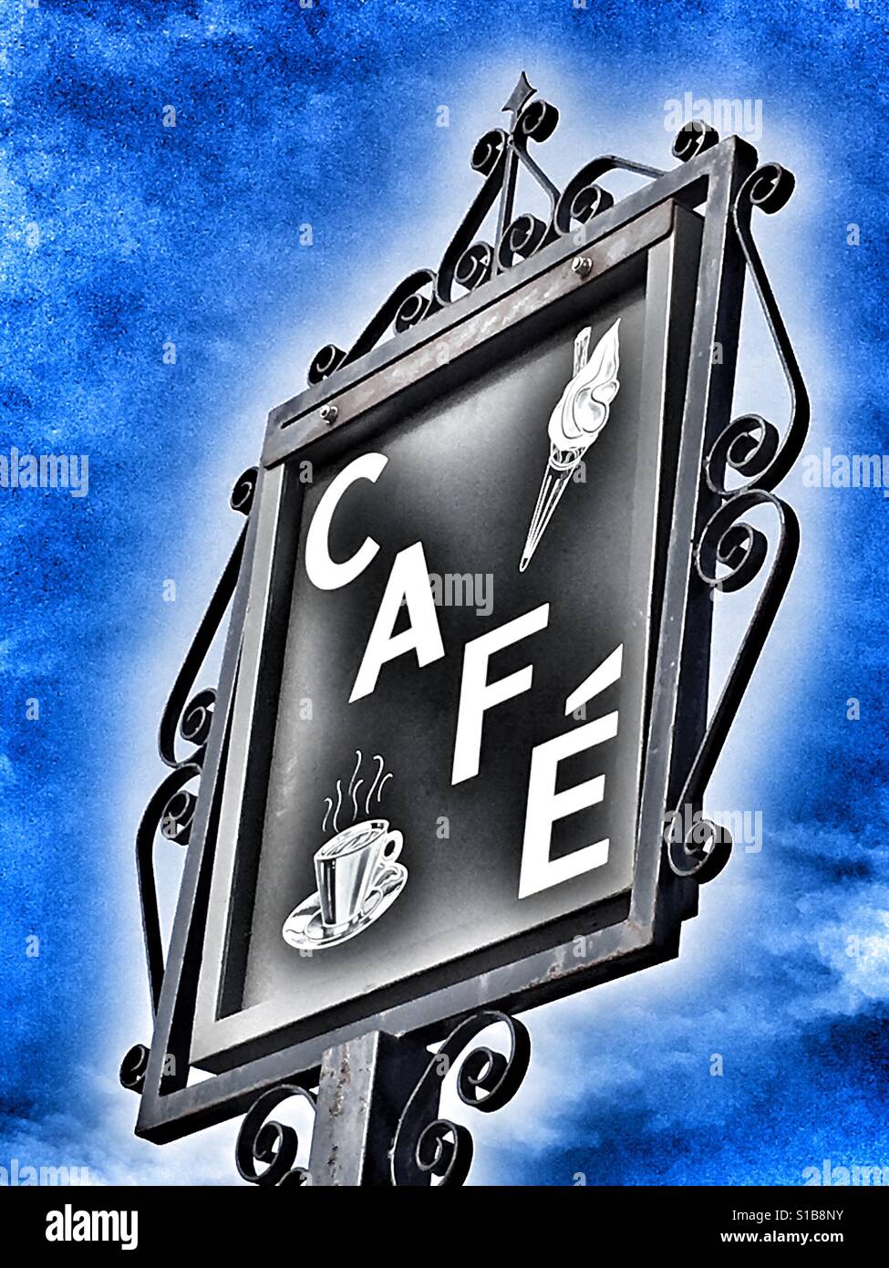 Cafe sign against blue sky Stock Photo - Alamy