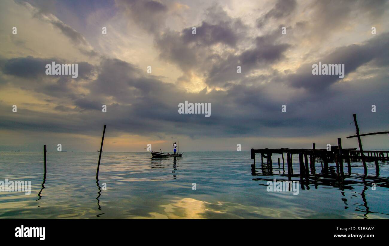Fisherman at beach Stock Photo - Alamy