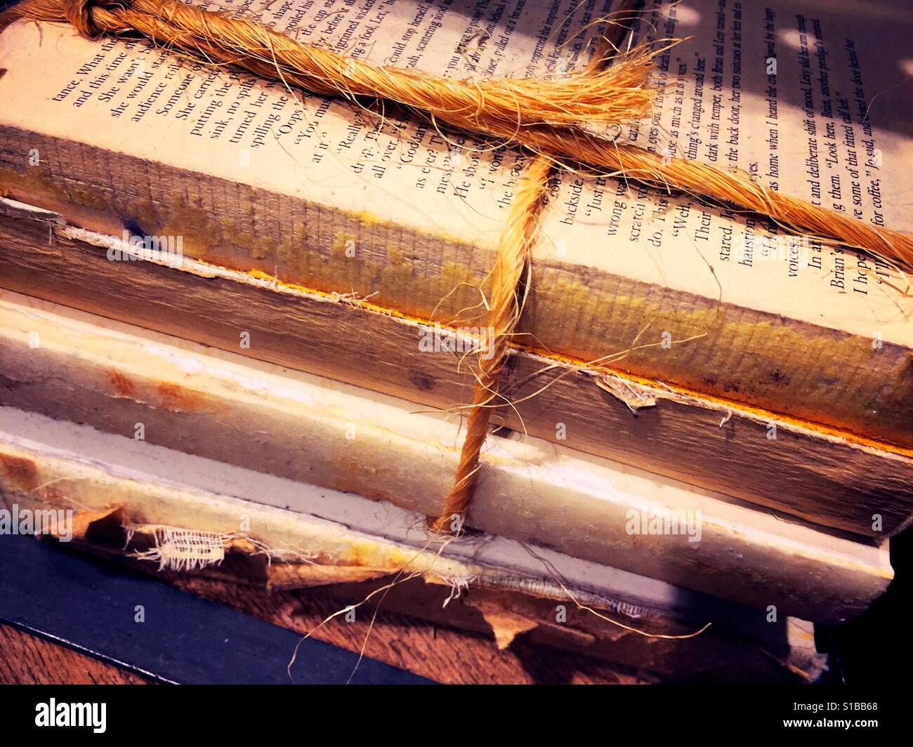 Vintage books with covers removed wrapped in twine, USA Stock Photo - Alamy
