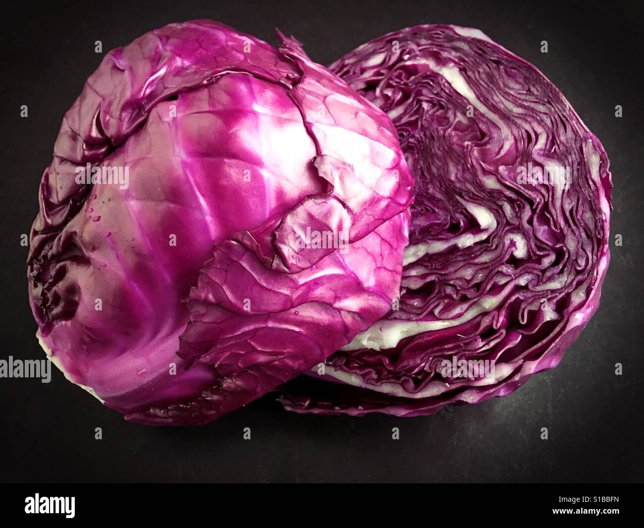 A split purple cabbage Stock Photo - Alamy