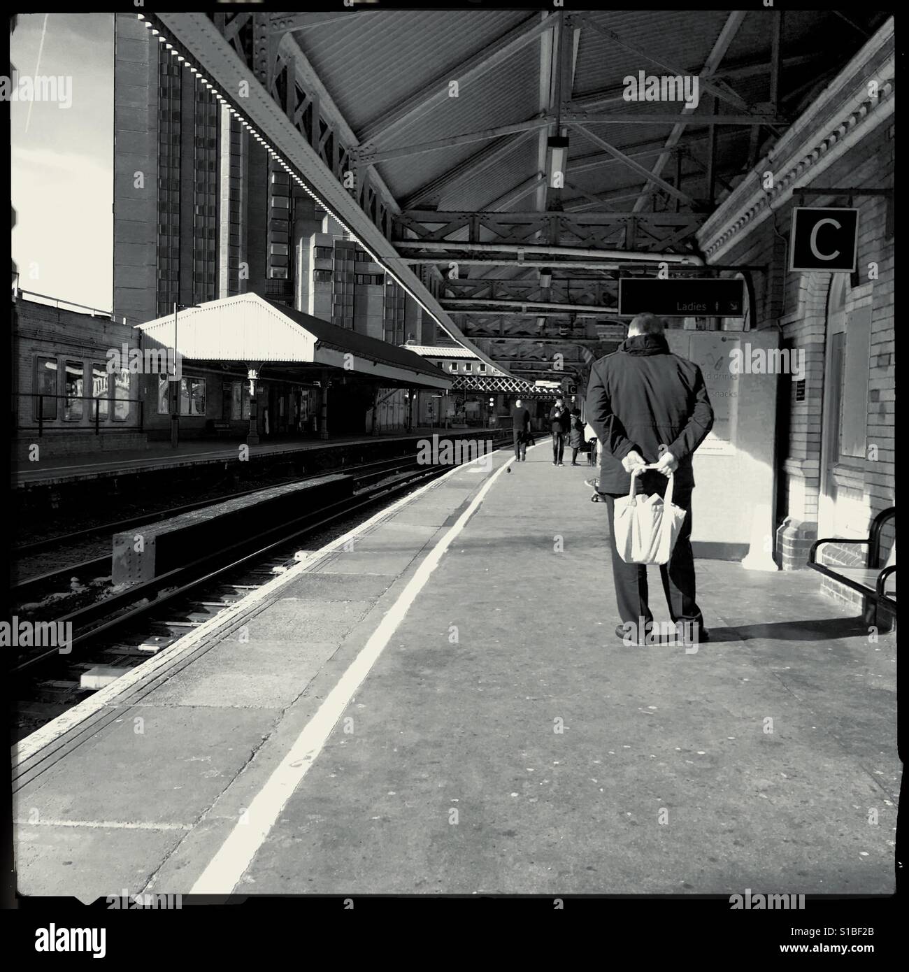 Commuters wait for a central line train at bank station hi-res stock ...