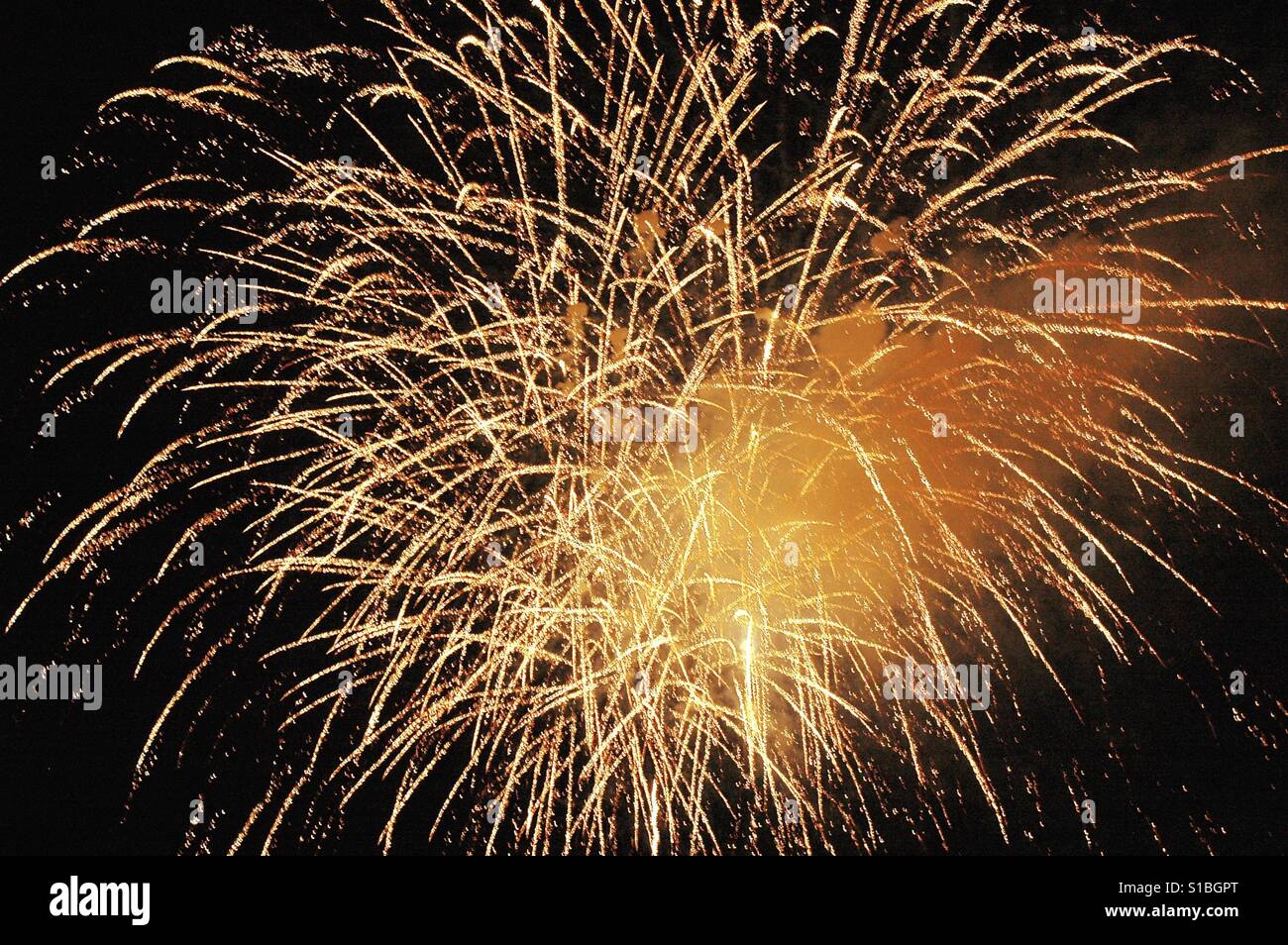 yellow fireworks falling Stock Photo - Alamy