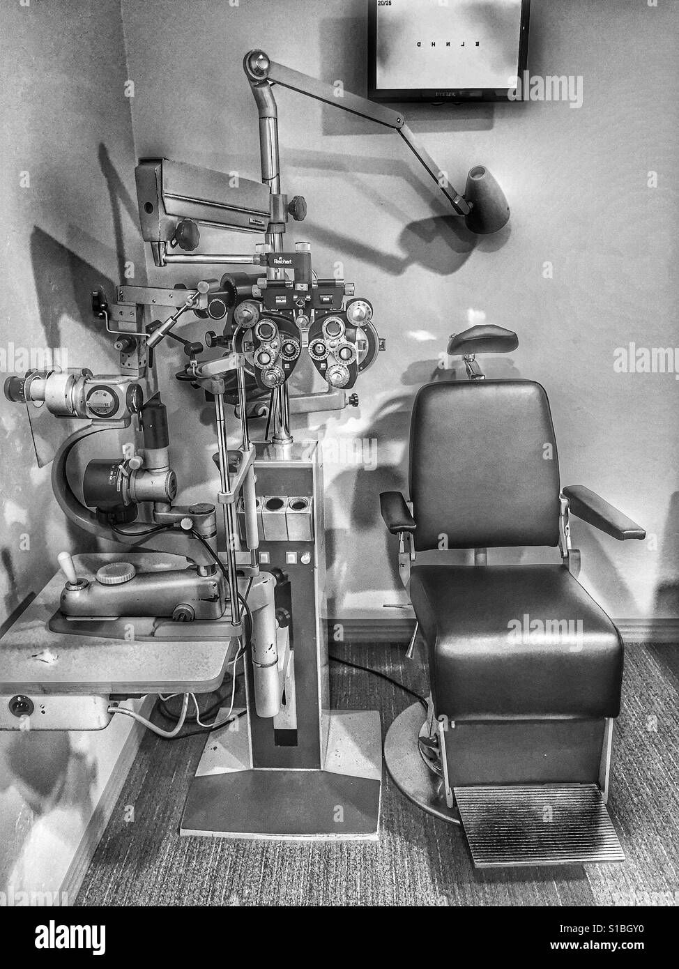 Eye exam doctor Black and White Stock Photos & Images - Alamy