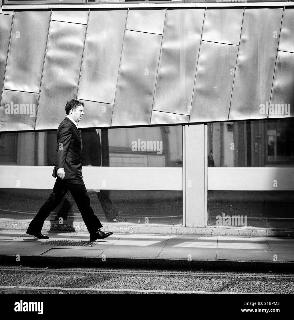 Man walking in London Stock Photo - Alamy