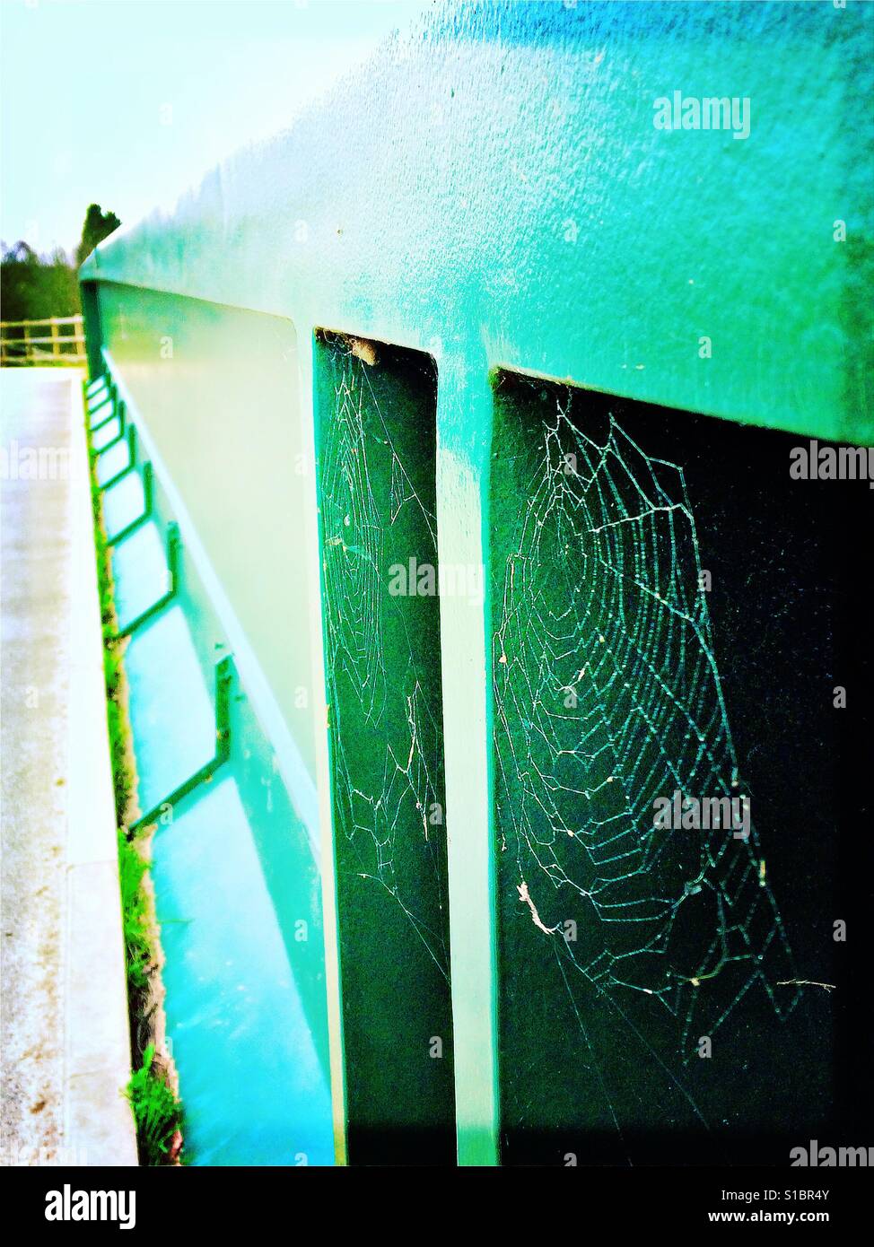 Cobwebs on a bridge over a railway line Stock Photo - Alamy