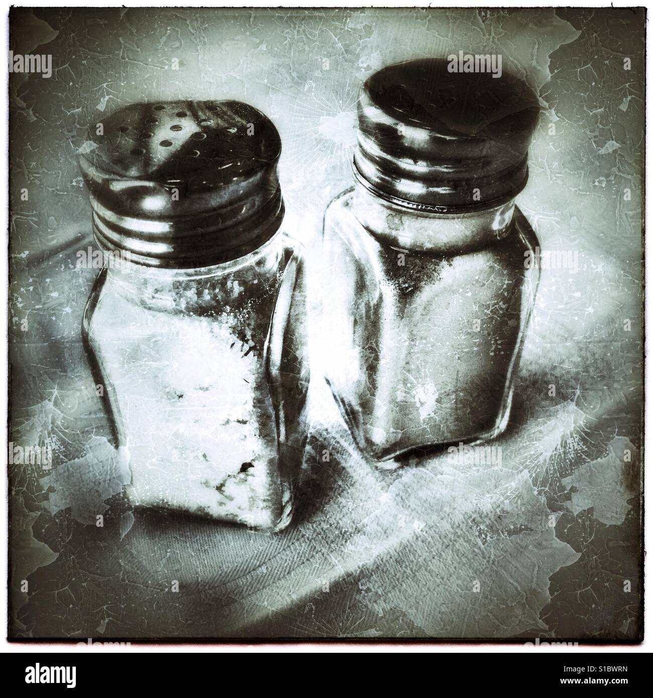 Salt and pepper shakers. Heavy use of filters Stock Photo - Alamy