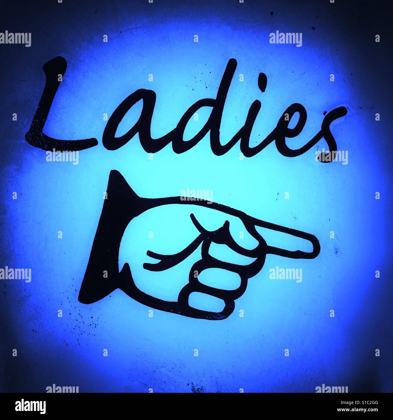 Ladies this way please Stock Photo - Alamy