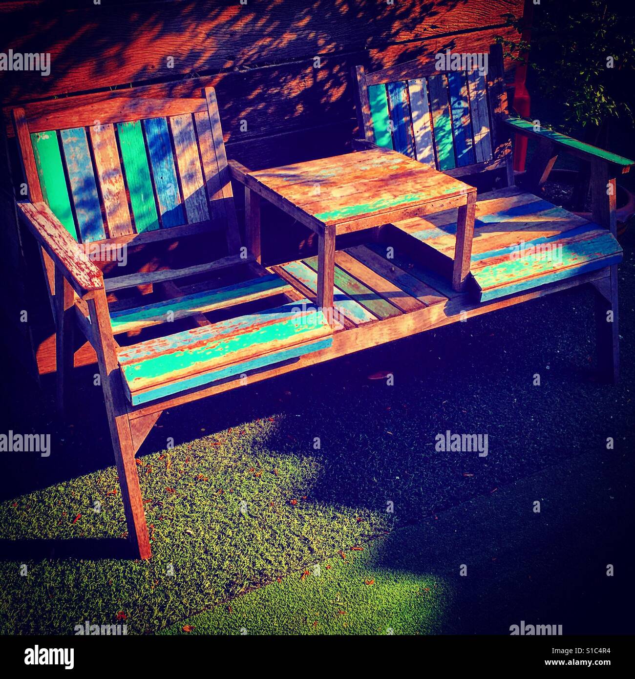 colourful bench in wood Stock Photo - Alamy