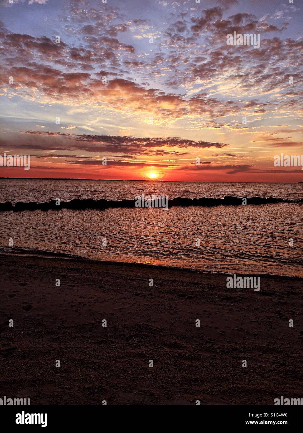 Sunrise over water hi-res stock photography and images - Alamy