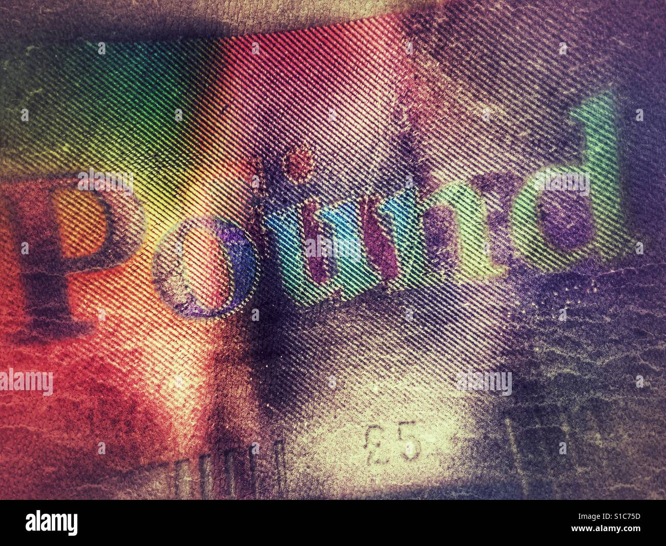 English £5 banknote. Macro on the holographic word Pound Stock Photo ...