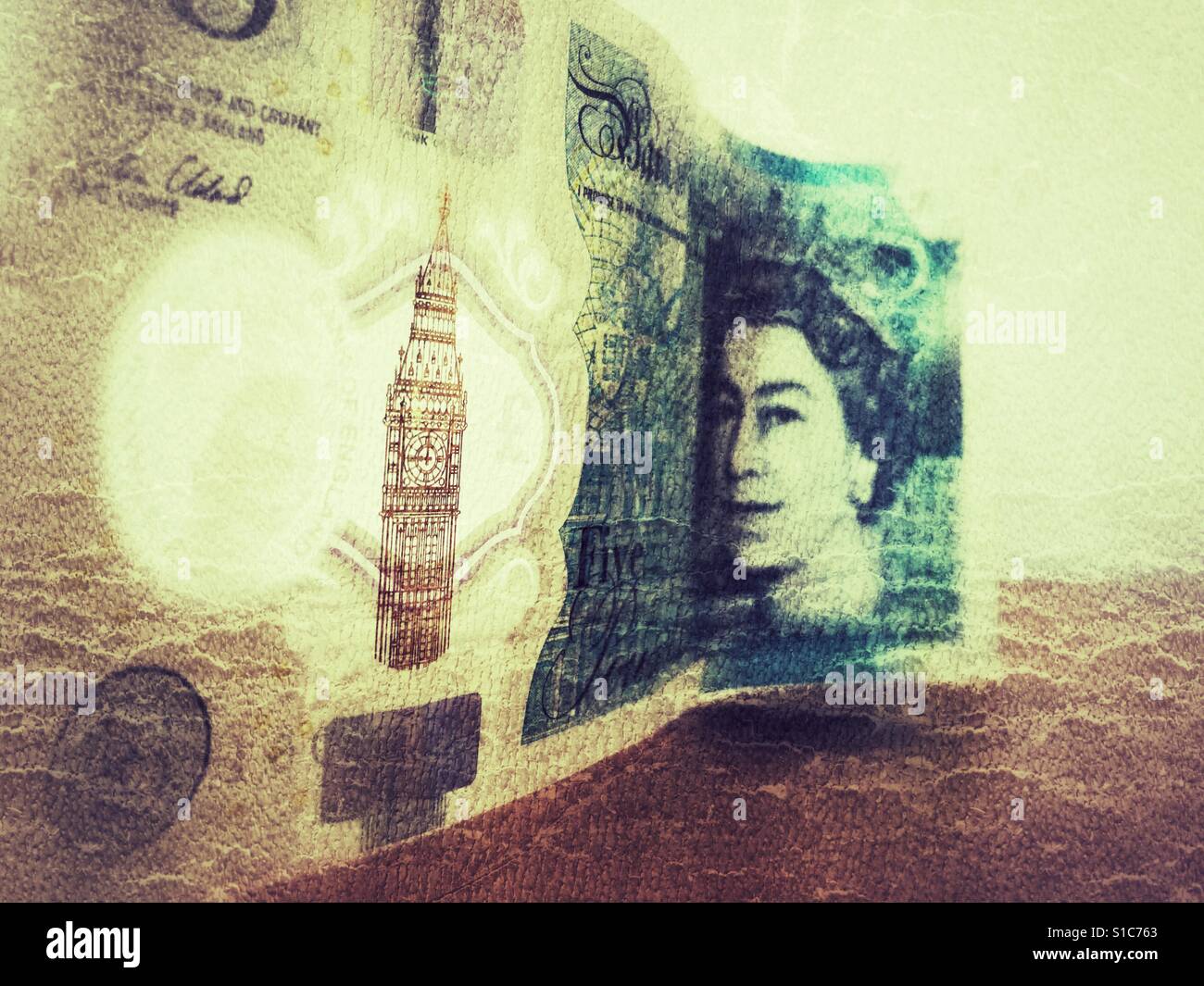 English £5 banknote, balanced on edge Stock Photo - Alamy