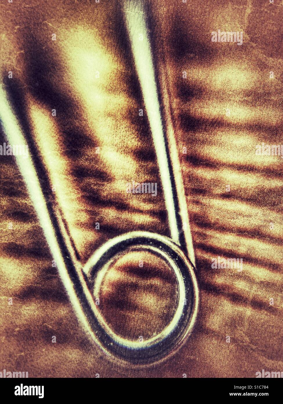 Safety pin macro Stock Photo - Alamy