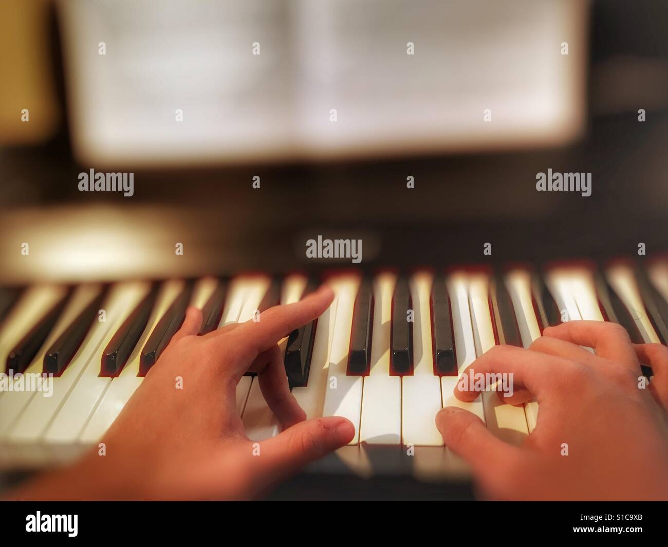 Piano playing hi-res stock photography and images - Alamy