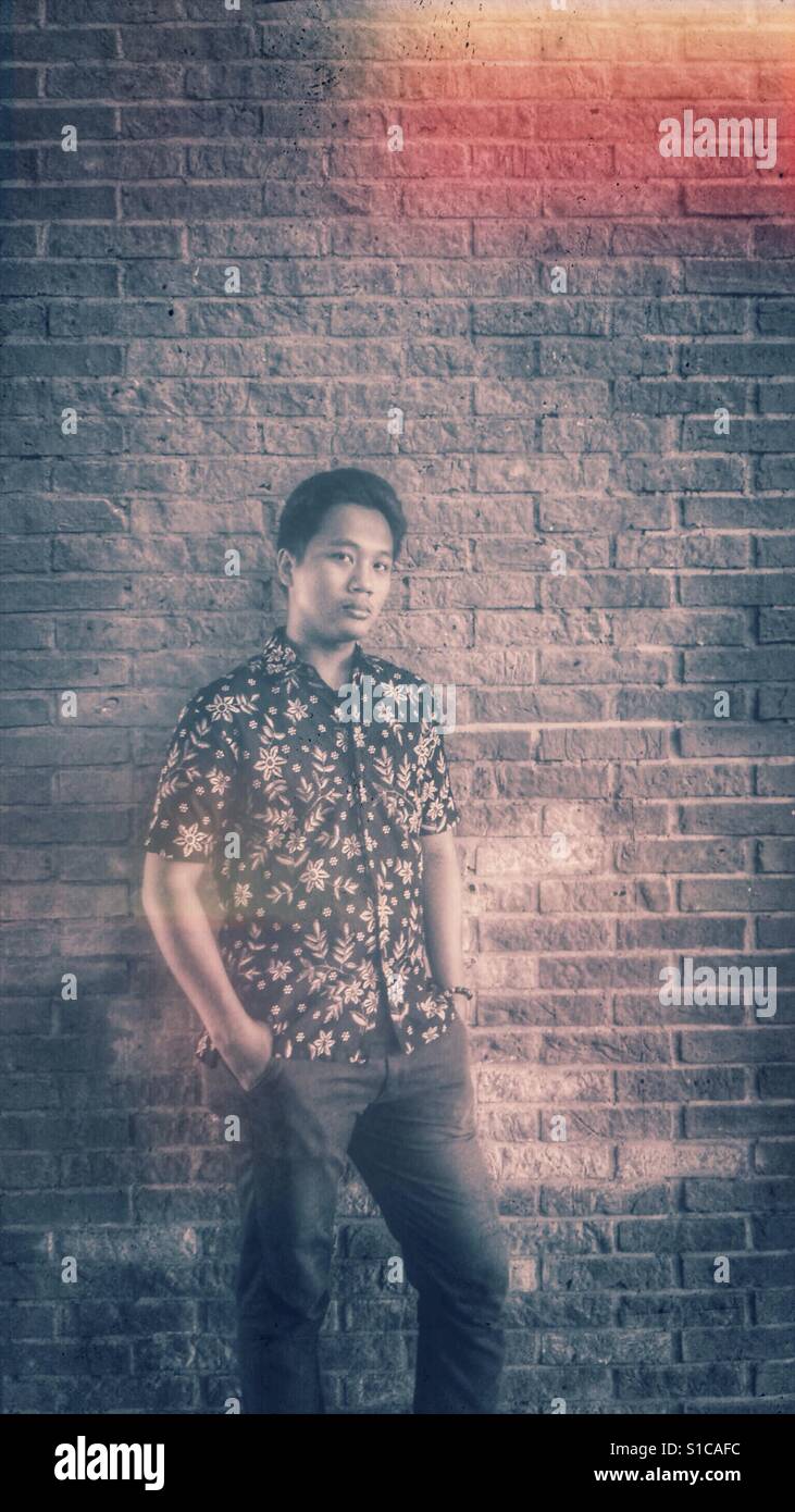 Wearing batik hi-res stock photography and images - Alamy