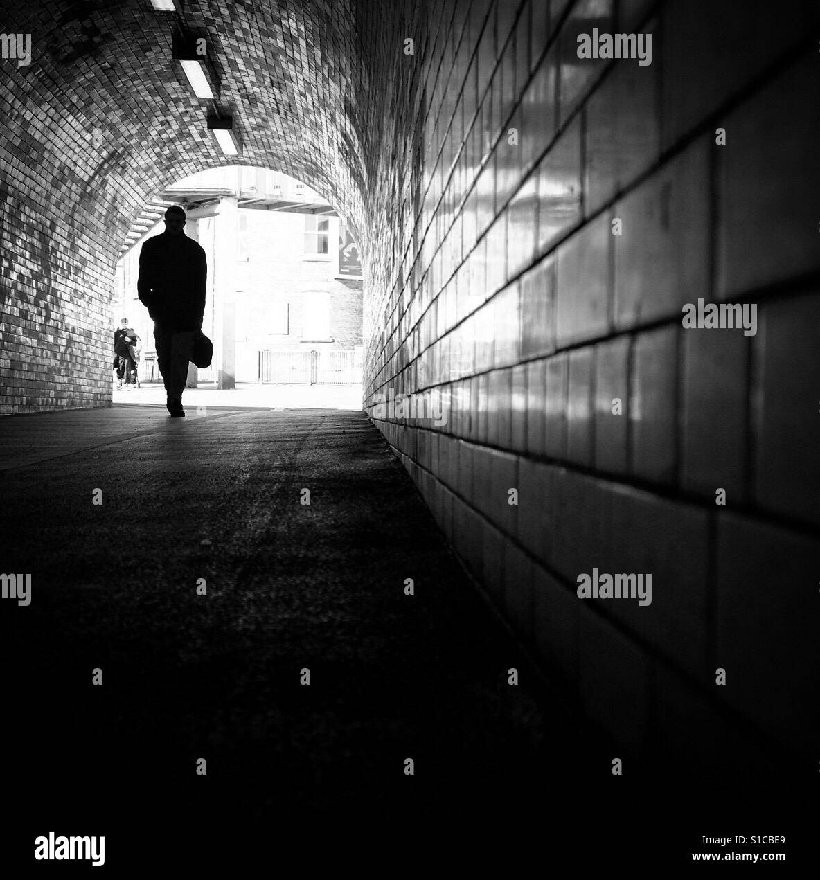 Silhouette man walking hi-res stock photography and images - Alamy