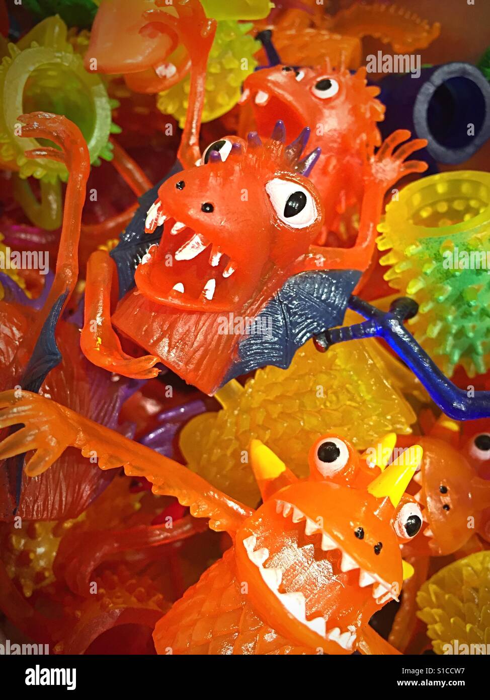 Monster finger puppets for sale in a large bin, USA Stock Photo - Alamy