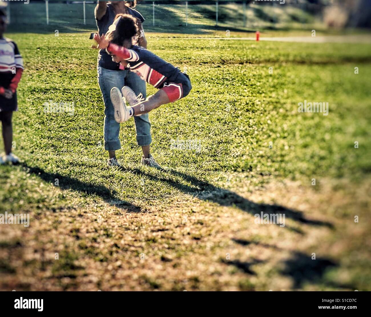 Cheerleader jump hi-res stock photography and images - Alamy
