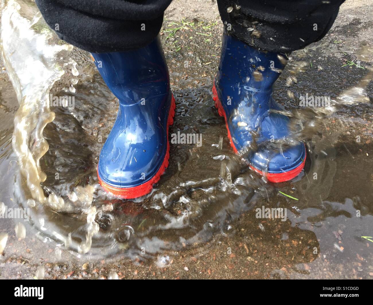 Muddy wellies hi-res stock photography and images - Alamy